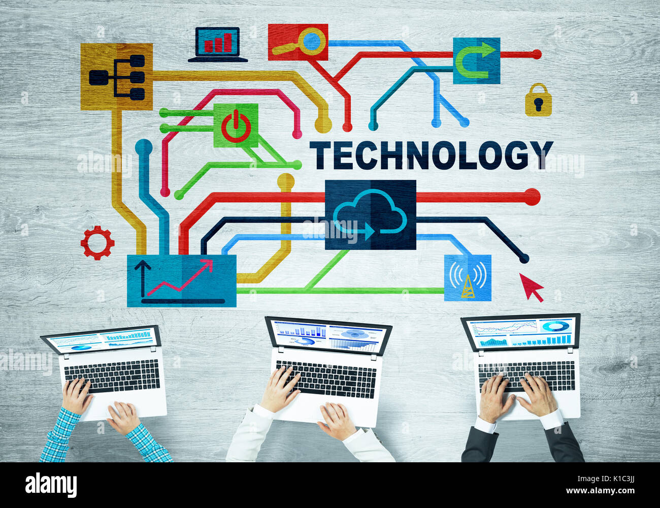 Group of three people with devices in hands working together as symbol ...