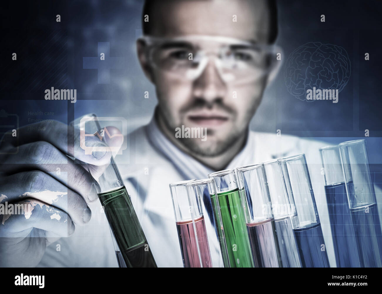 Young scientist mixing reagents in glass flask in clinical laboratory ...