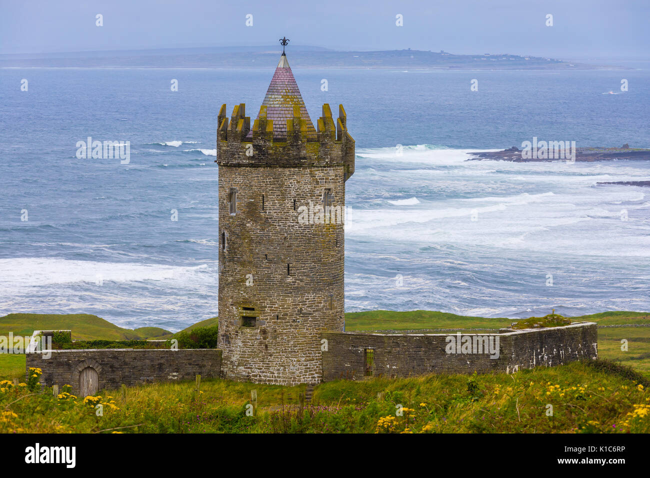 Doonagore Castle is a round 16th-century tower house with a small ...