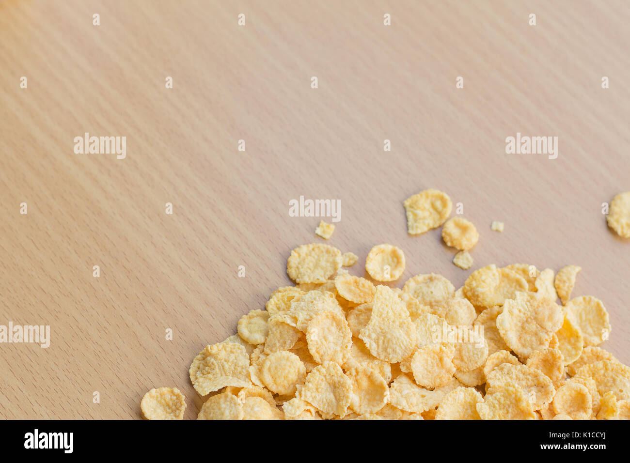 A pile of cereal on wood table (soft focus Stock Photo - Alamy