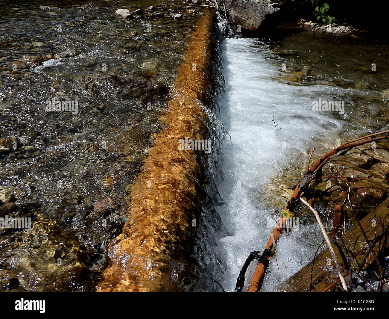 small waterfall, artificial cascade on the river Stock Photo - Alamy