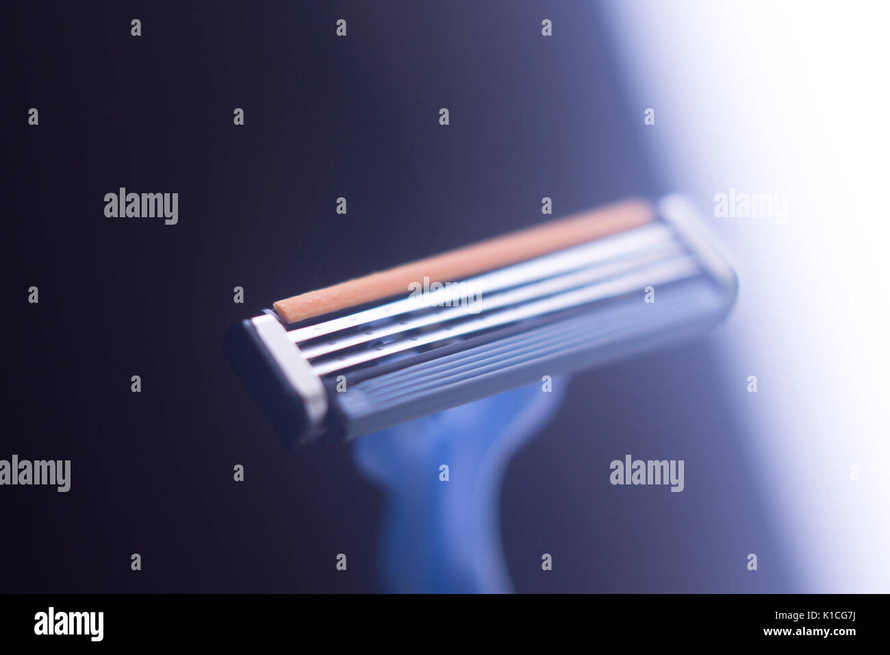 Modern safety disposable plastic shaving razor with multiple blades and ...