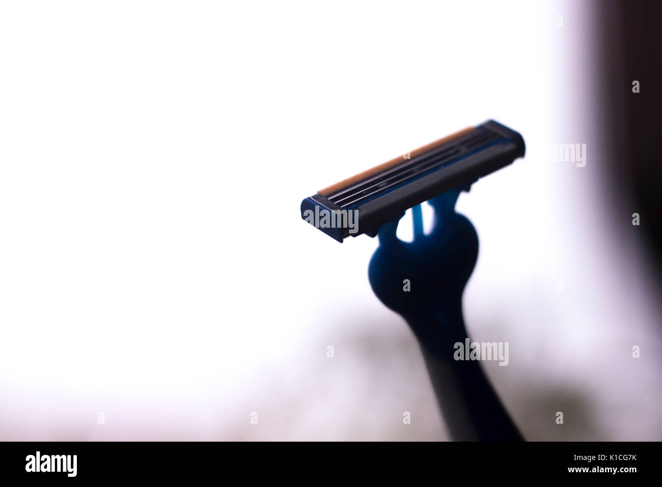 Modern safety disposable plastic shaving razor with multiple blades and ...