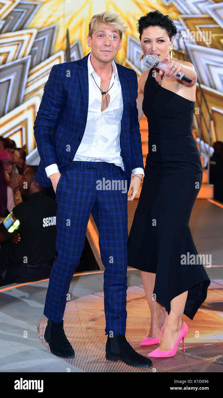 Sam Thompson and host Emma Willis during the live final of Celebrity ...