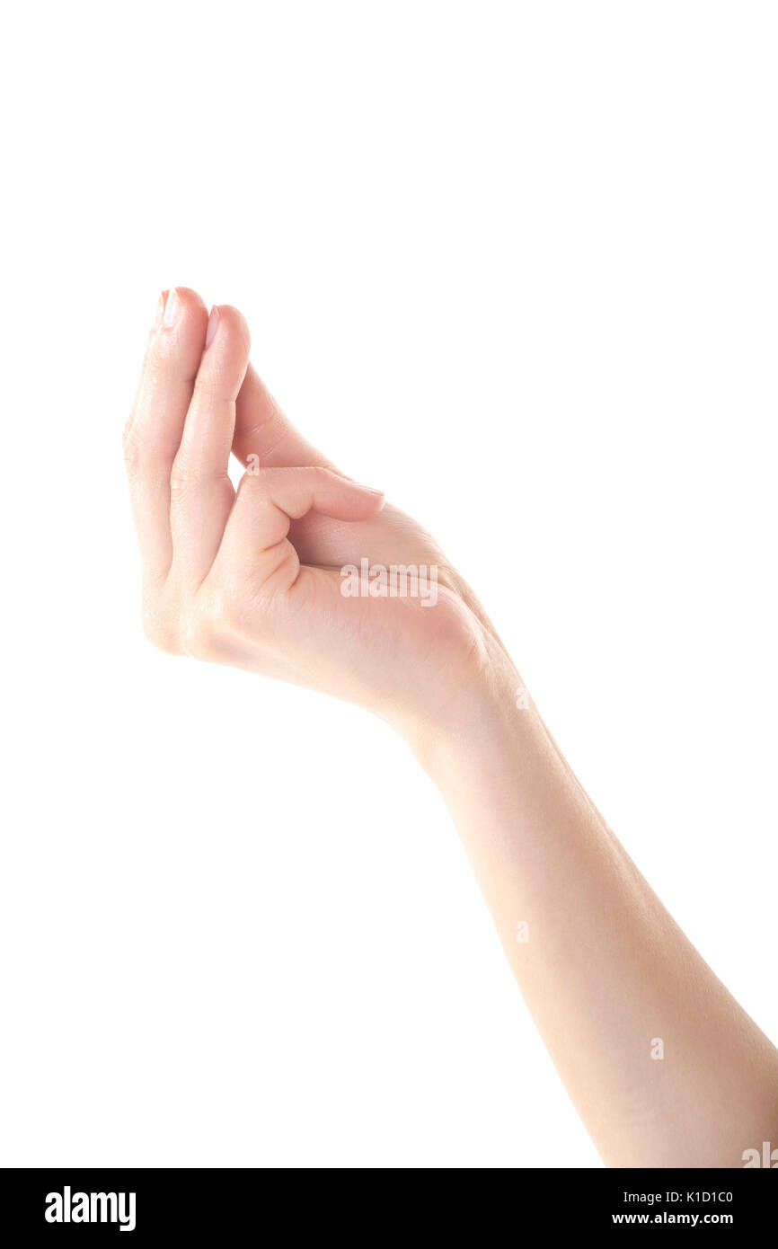 A gentle female hand is making tasty sign with her right hand on ...