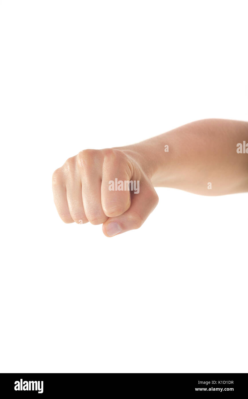 A gentle female hand is hitting something with her right hand on ...