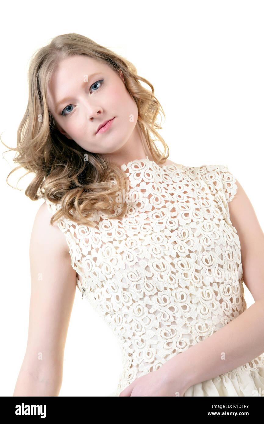 Old fashioned female model is posing in front of an isolated white ...