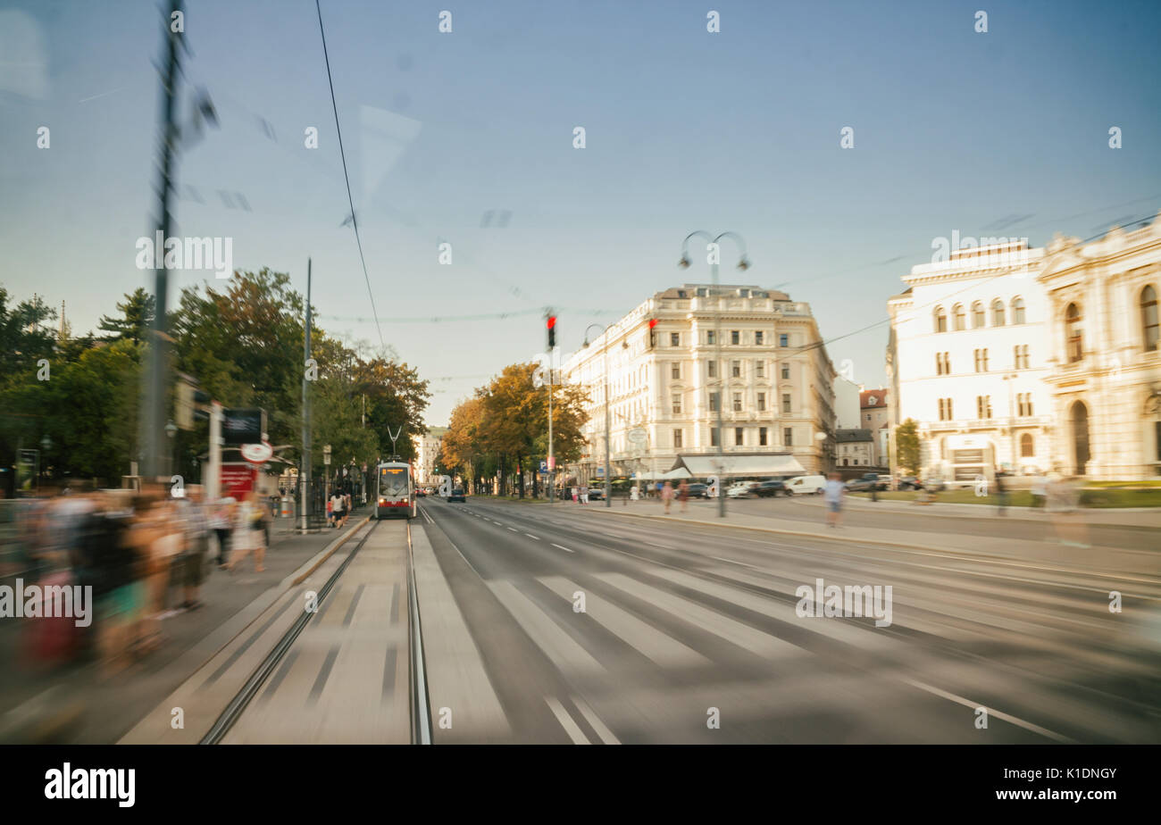 Vienna downtown, taken from driving train motion blur Stock Photo - Alamy