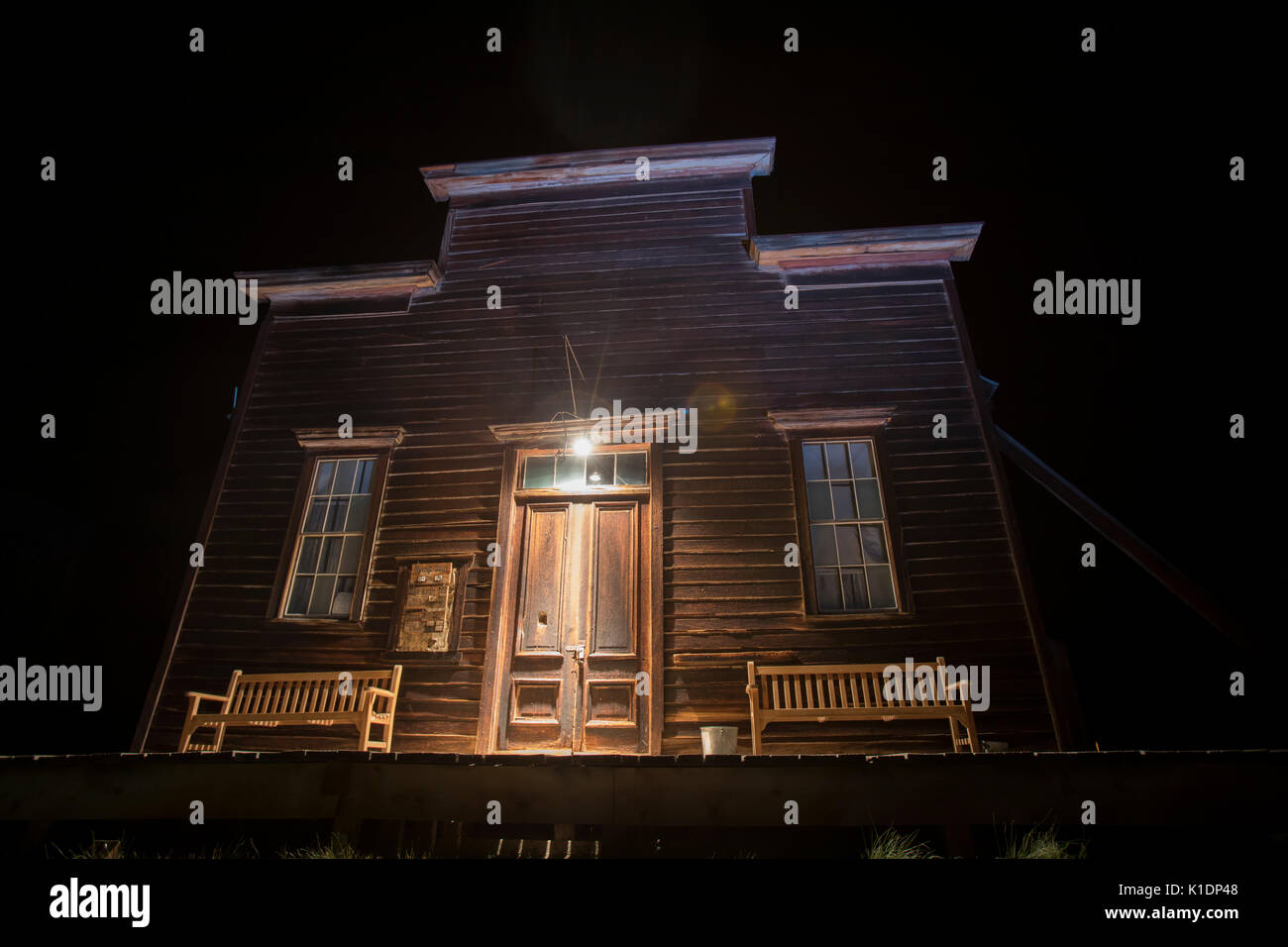 Miners Union Hall illuminated at night in Bodie State Historic Park ...