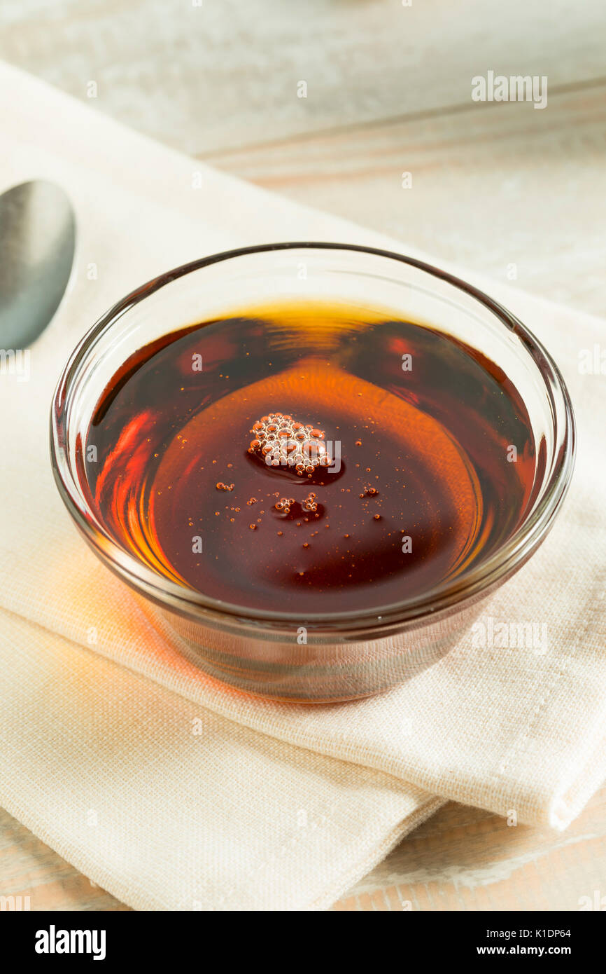 Raw Organic Dark Agave Syrup in a Bowl Stock Photo - Alamy