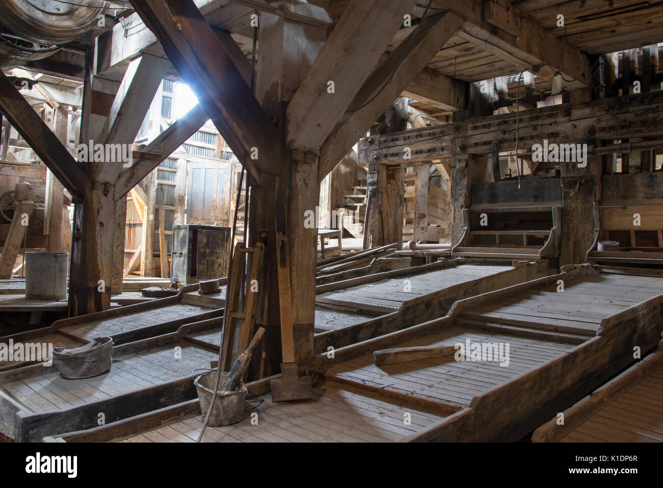 Manchinery and equipment inside stamp or standard mill in gold mine in ...