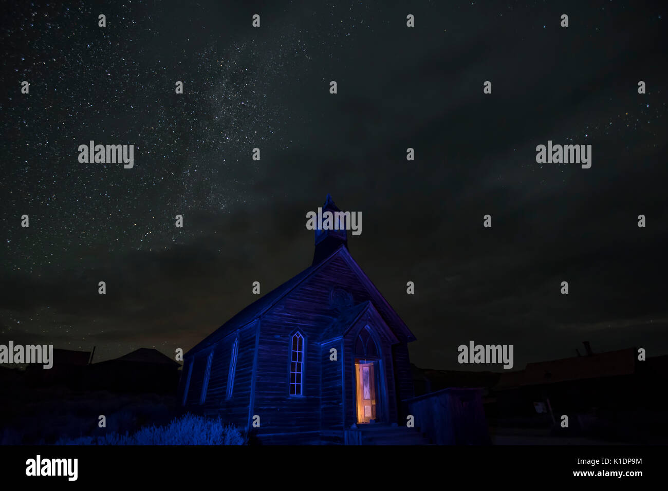 Methodist church illuminated against night skies in Bodie State Historic Park Stock Photo - Alamy