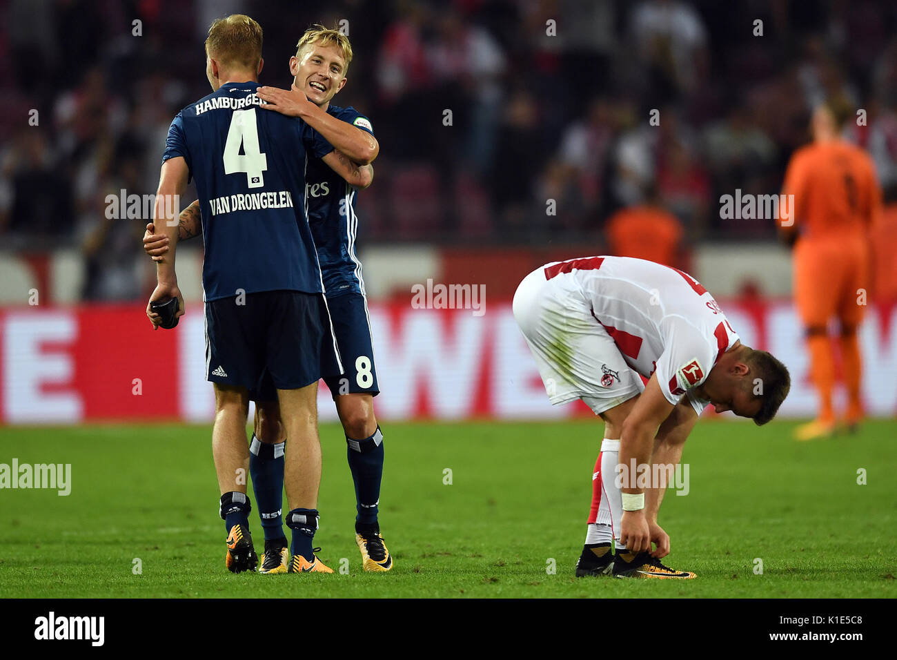 Hamburg's Rick van Drongelen (l) and Lewis Holtby celebrate their 1:3 ...