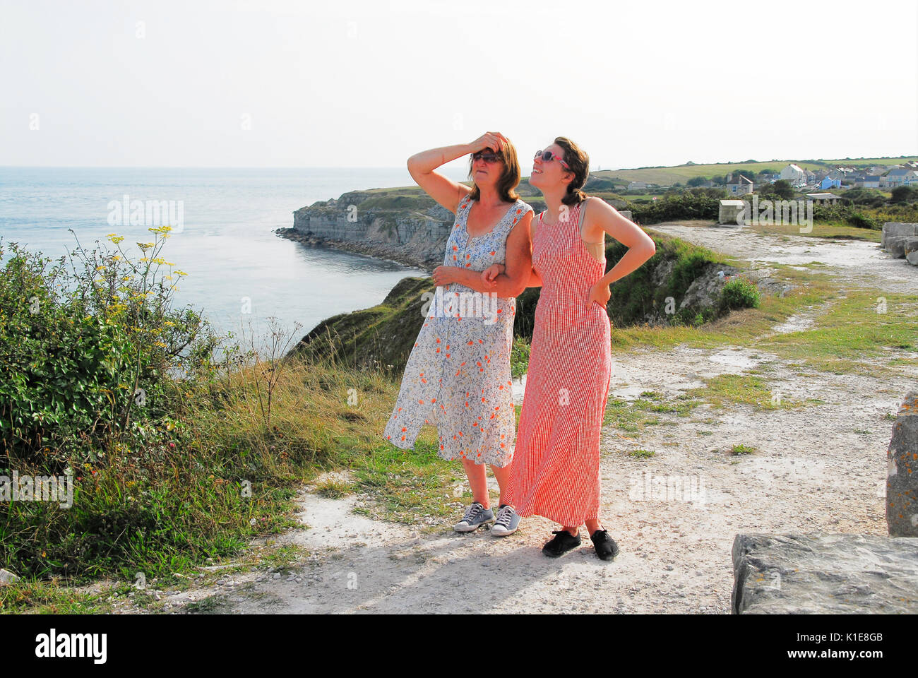 Portland Bill, Dorset, UK . 26th August 2017 - Two women spot something ...
