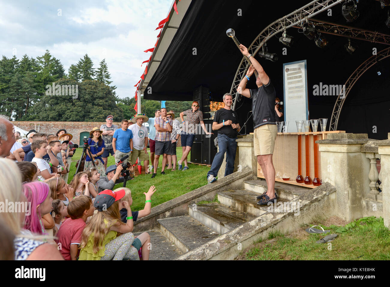 Man drinking a yard of ale in a drinking contest, Somerley Beer and ...