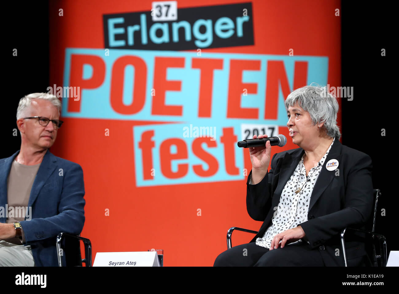 Erlangen, Germany. 26th Aug, 2017. Philosopher Florian Goldberg (l) and ...