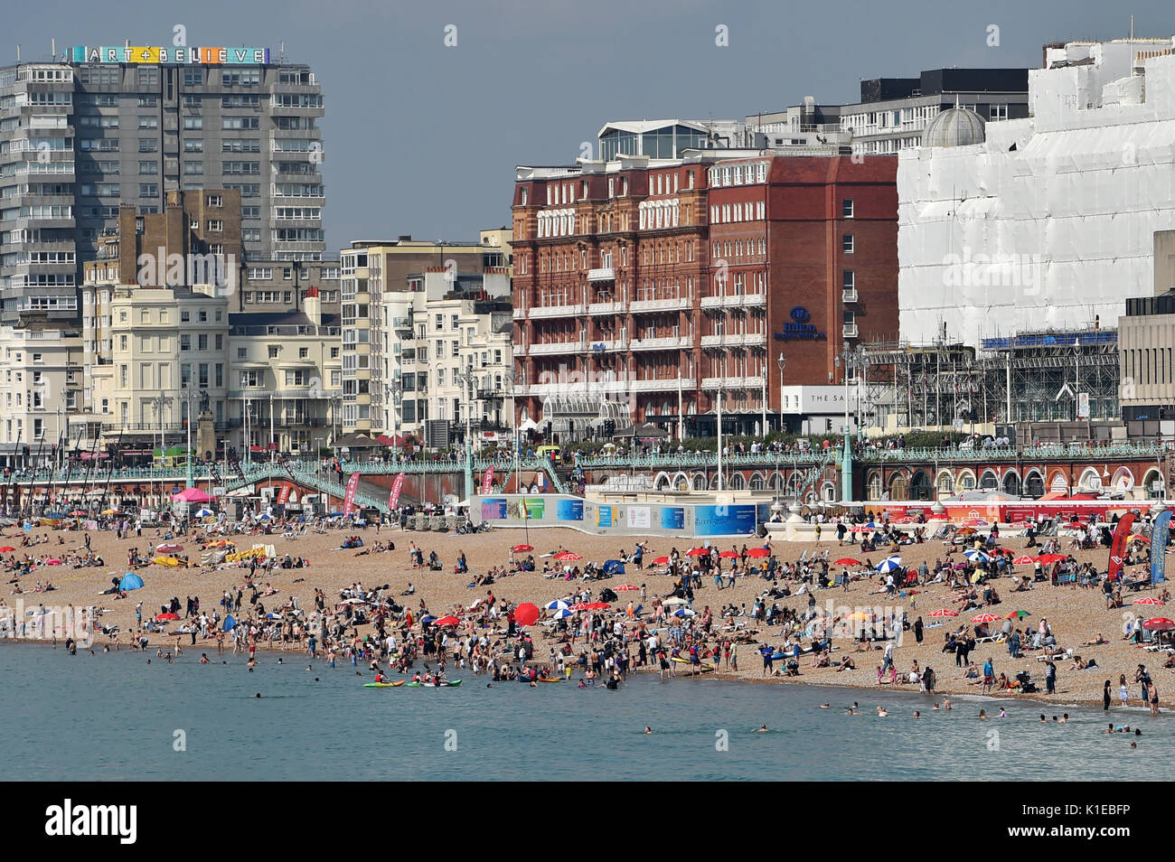 Brighton, UK. 27th Aug, 2017. Crowds enjoy the beautiful hot sunny ...
