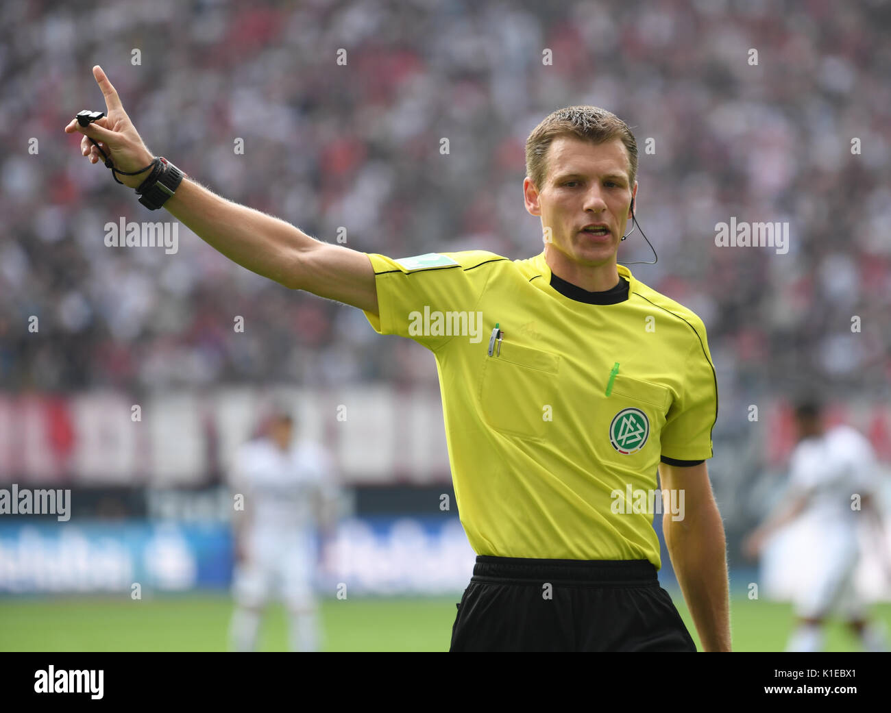 Match referee Benjamin Cortus in action during the Bundesliga match ...