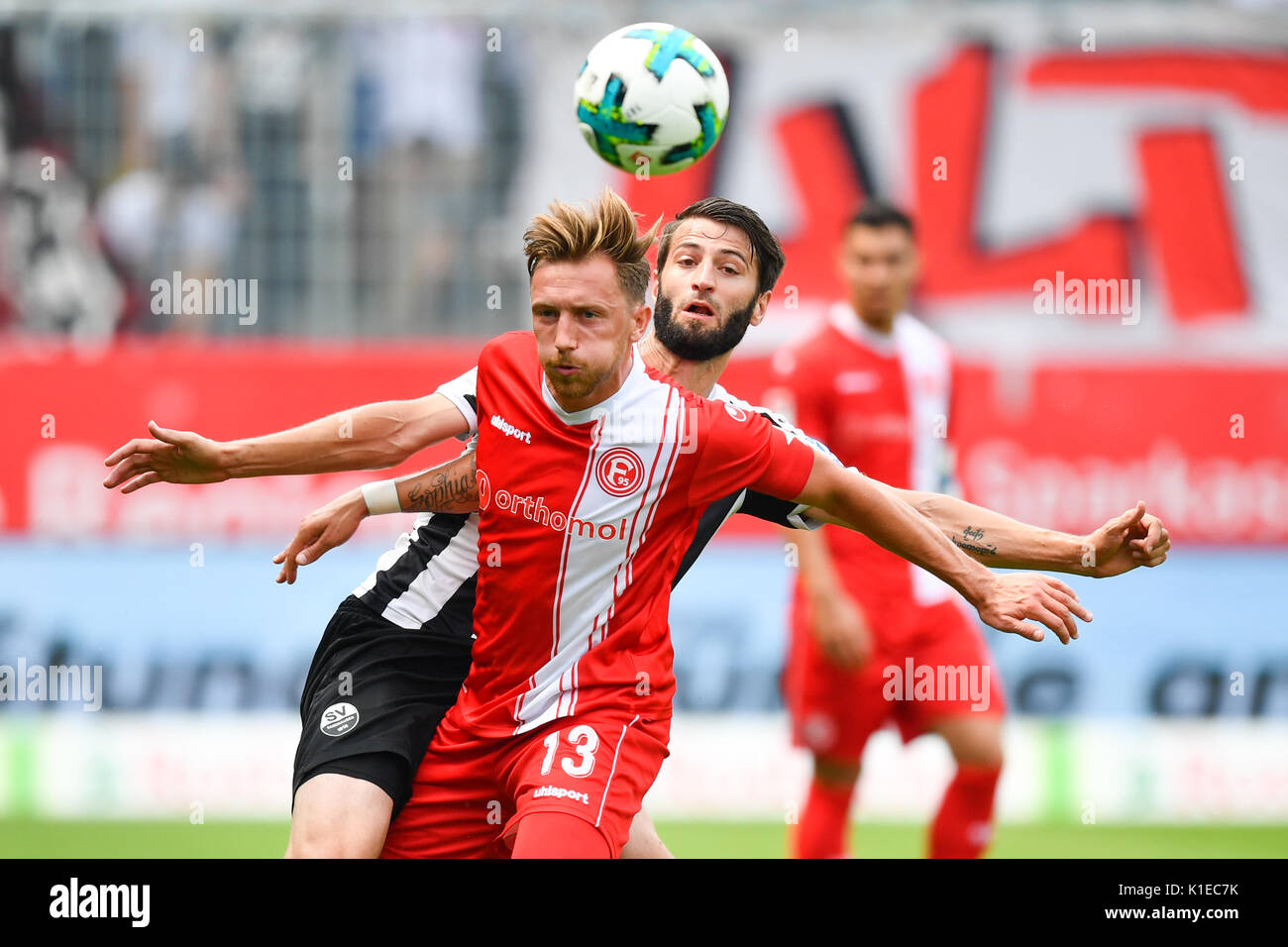 Sandhausen, Germany. 27th Aug, 2017. Sandhausen's Markus Karl (back ...