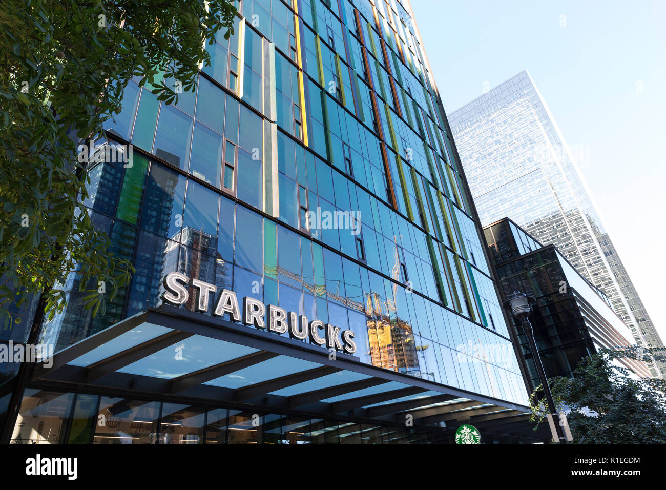 Seattle, Washington: Construction cranes reflected against the Doppler ...