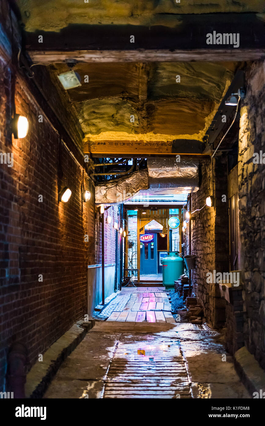 Empty narrow alleyway with street lights hi-res stock photography and ...