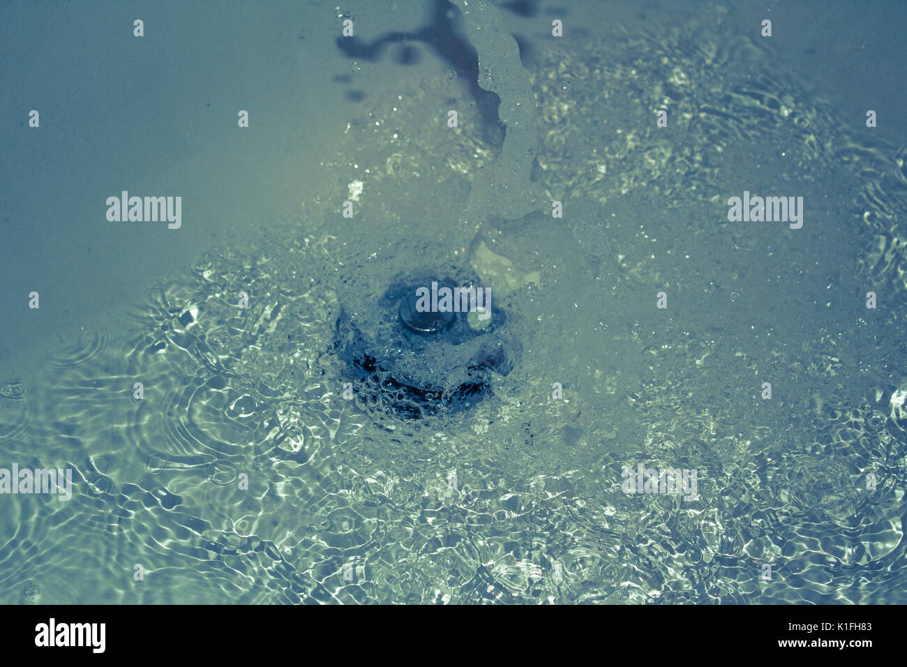 Trickle down effect hi-res stock photography and images - Alamy