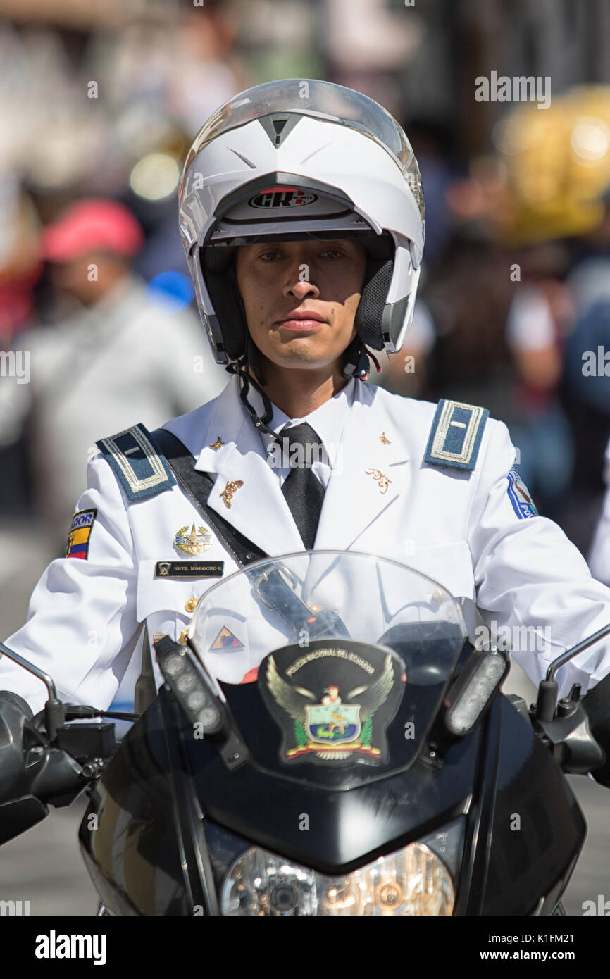 June 17, 2017 Pujili, Ecuador: a member of national police in festive ...