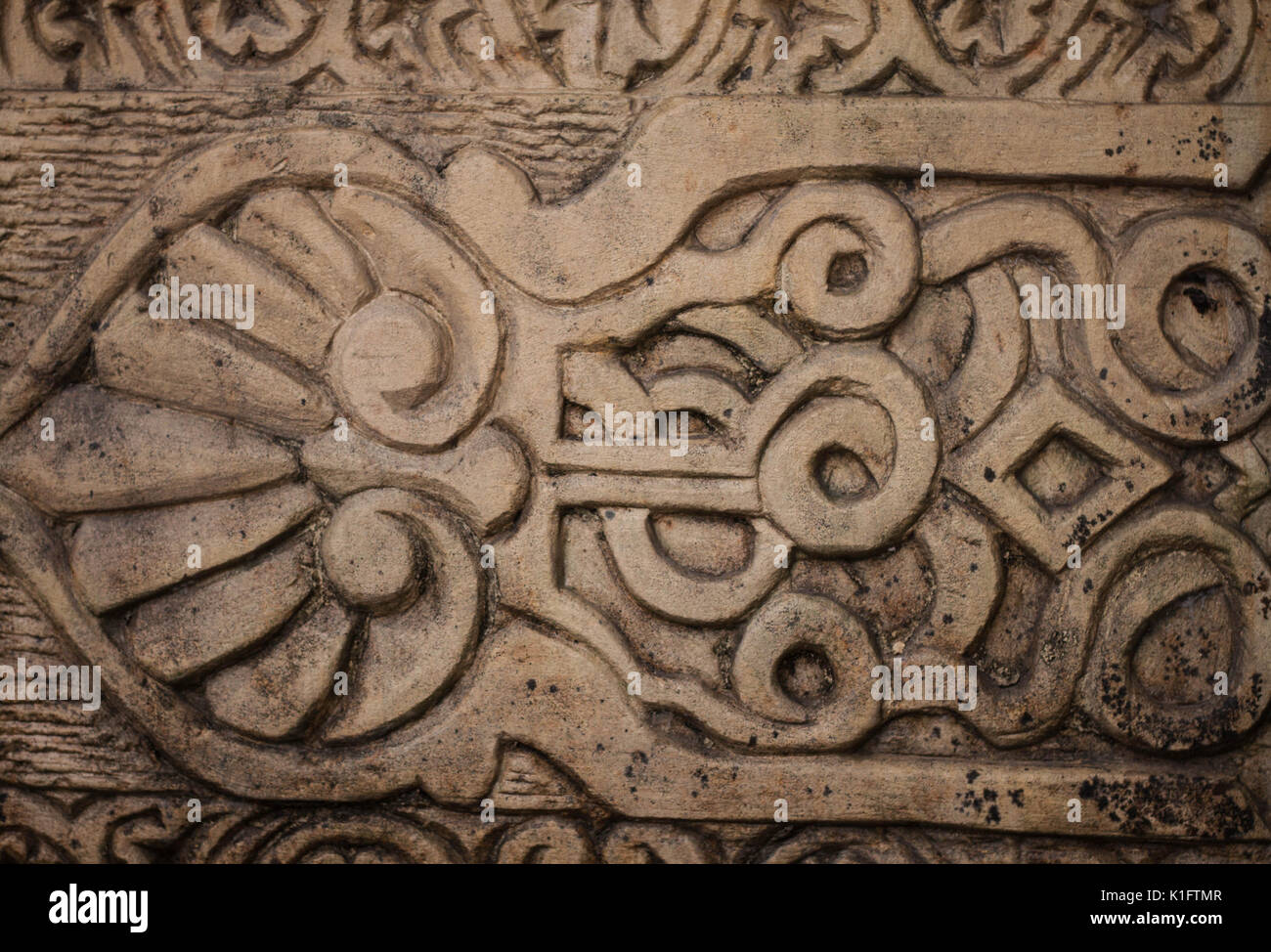 an indonesia sculpture on stone with dark style and detail pattern java ...