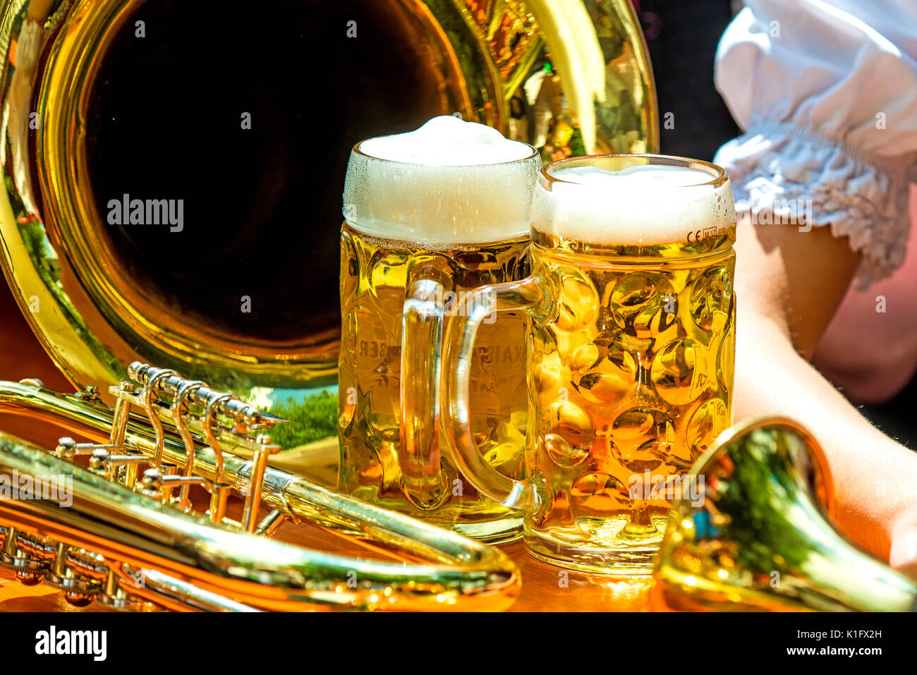 beer mugs with trumpet Stock Photo - Alamy