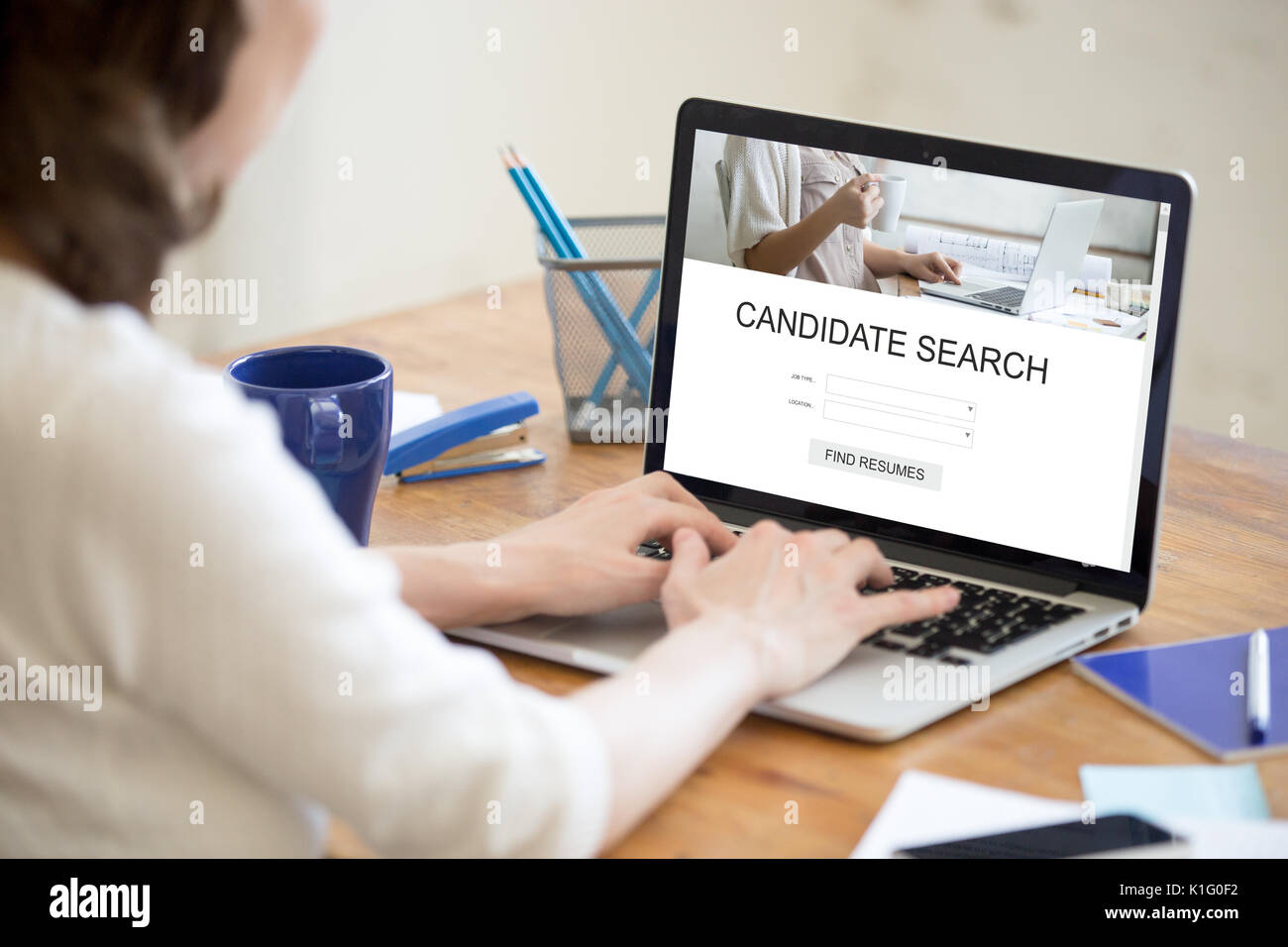 HR manager searching for new candidates online, human resource m Stock ...