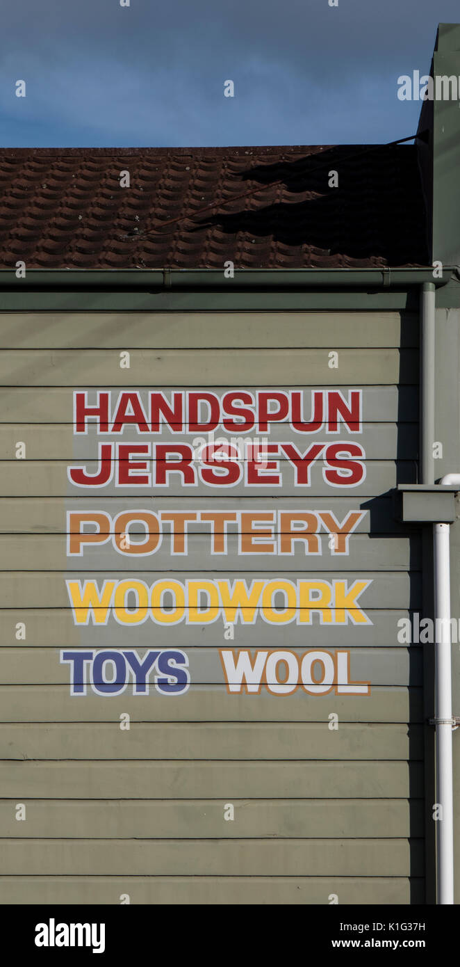 Signage for hand crafts on side of old wooden building Stock Photo - Alamy
