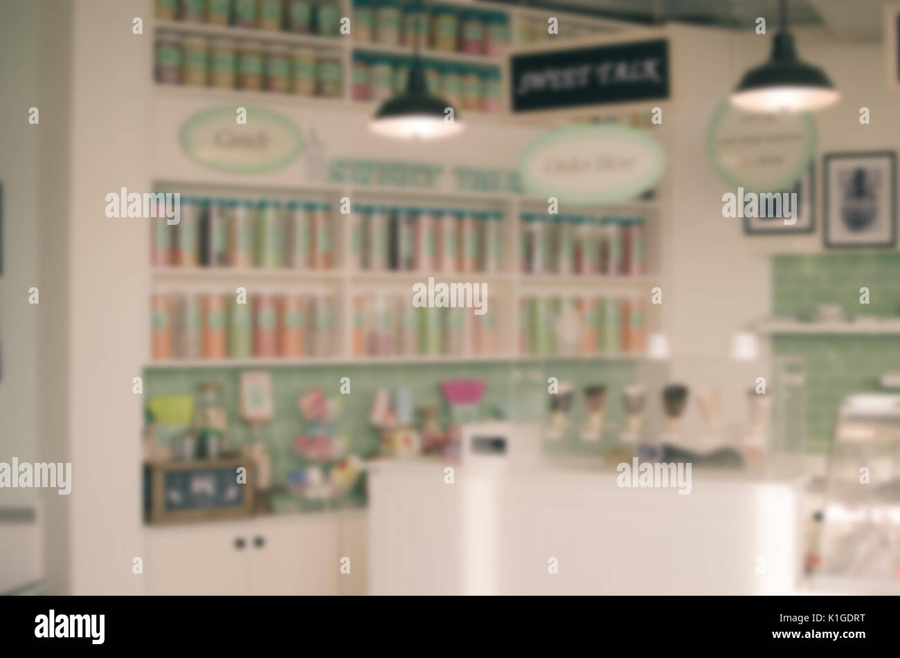 Blurred abstract background dessert shop display interior, vintage tone ...