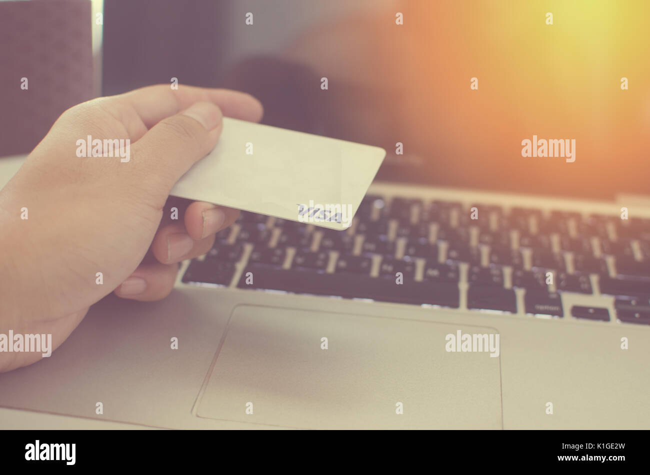 hand hold credit card use online products Stock Photo - Alamy