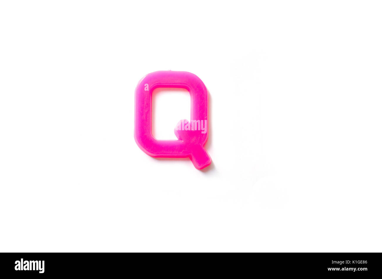 Plastic letters Q isolated white background Stock Photo - Alamy