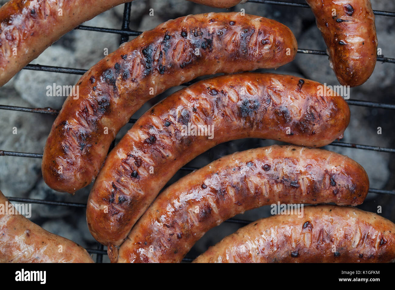 Traditional Polish sausages being prepared on a barbecue Stock Photo ...