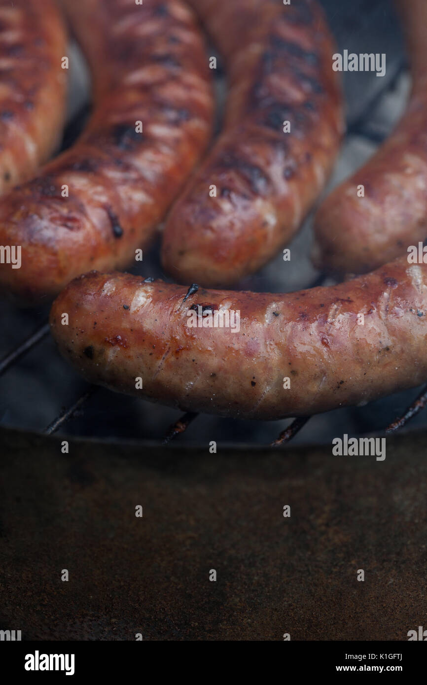 Traditional Polish sausages being prepared on a barbecue Stock Photo ...