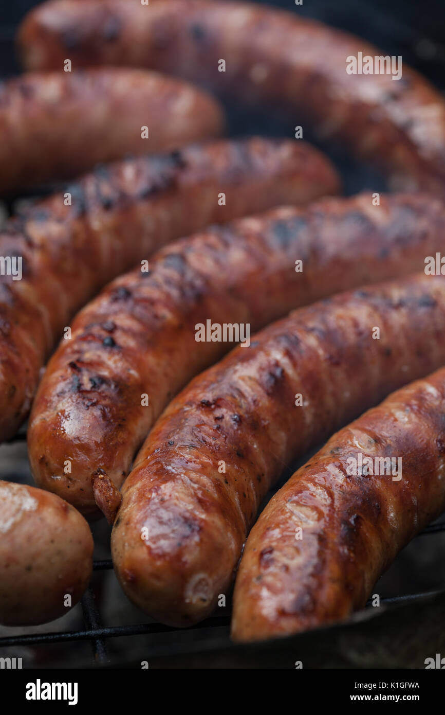 Traditional Polish sausages being prepared on a barbecue Stock Photo ...