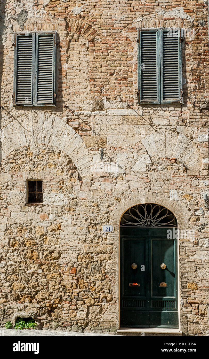 TUSCANY-JUNE 2:The facade of a typical tuscan house with front door and ...