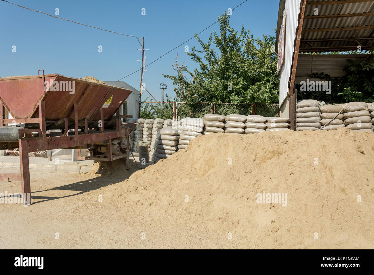 Equipment for the packing of building materials. Sand packing equipment ...