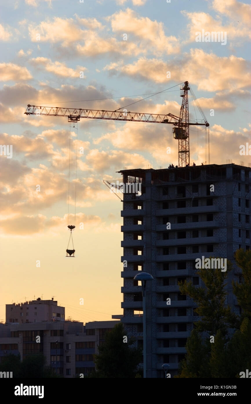 Construction of the building at sunset time lapse Stock Photo - Alamy