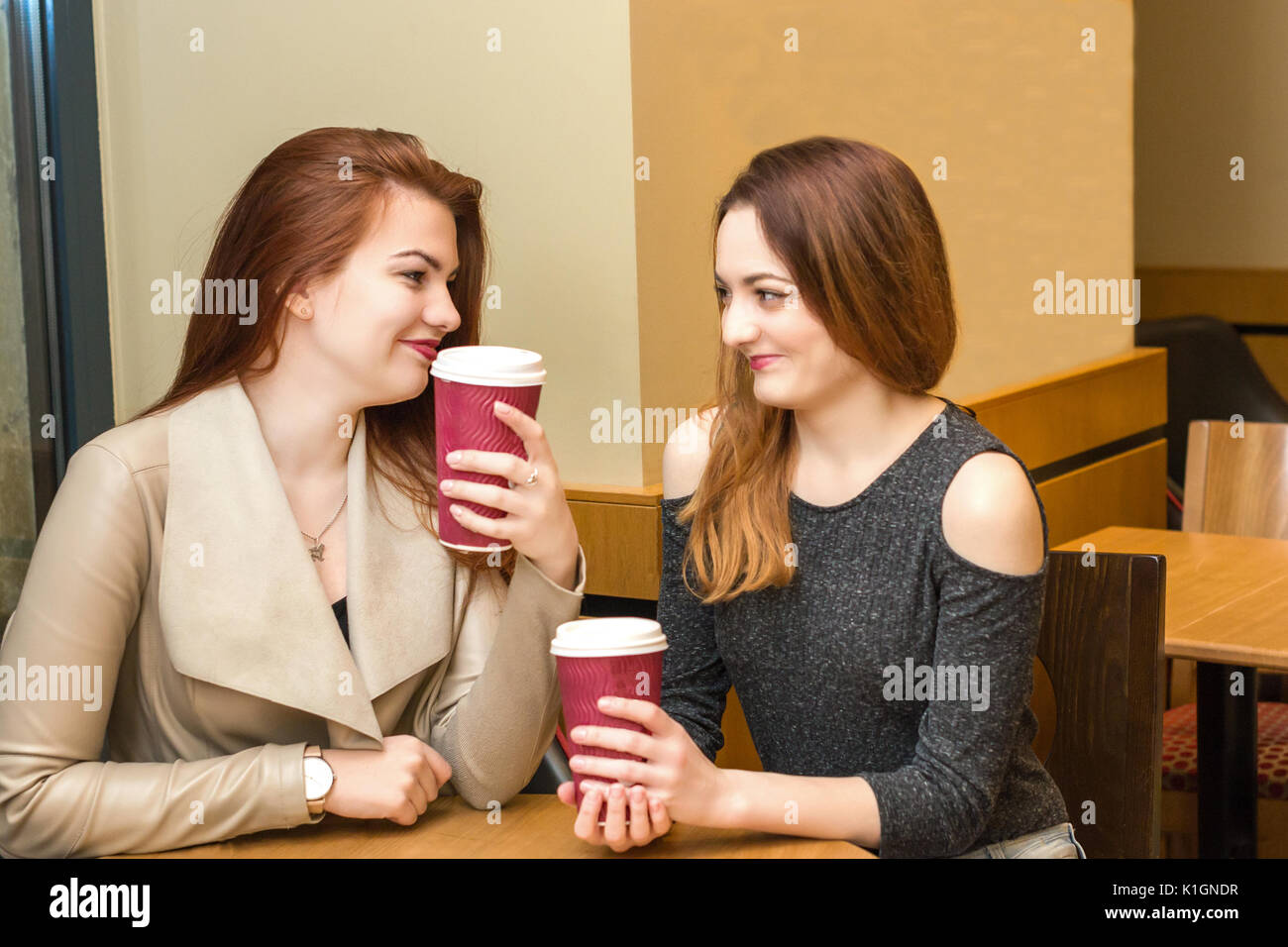 Sitting together in a trendy bar hi-res stock photography and images ...