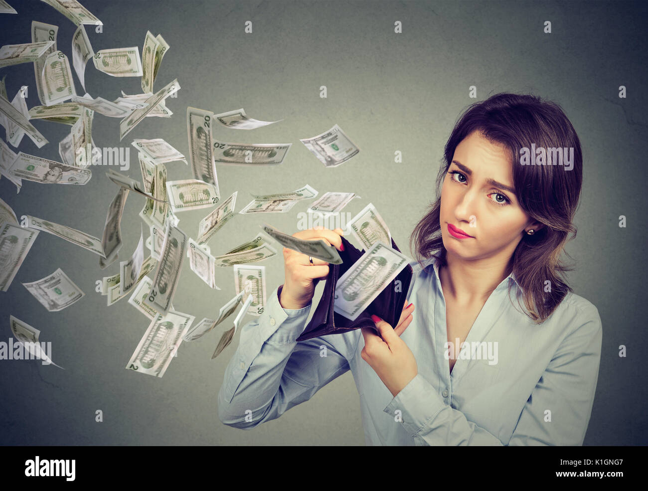 Wallet money flying hi-res stock photography and images - Alamy