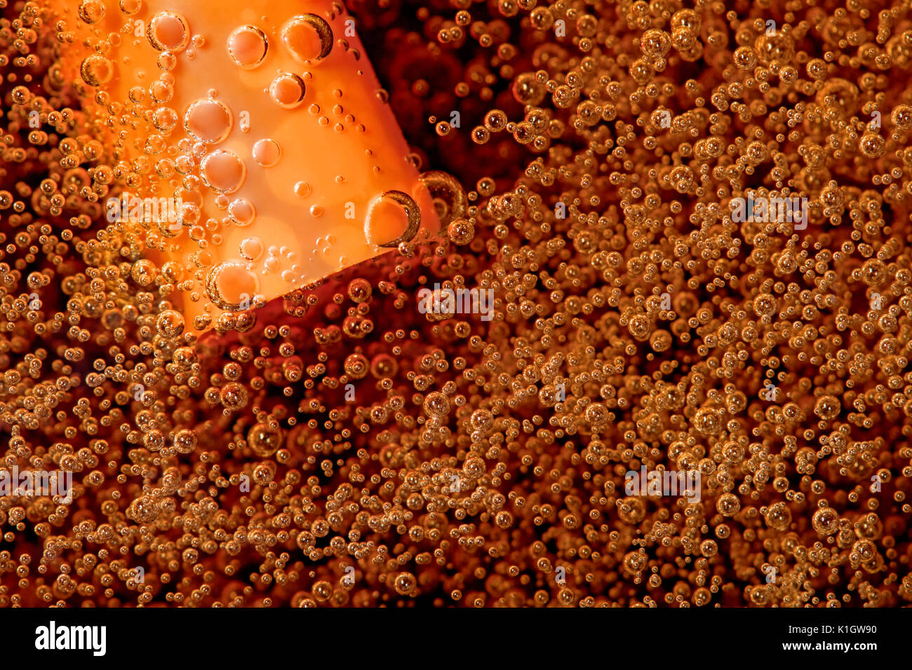 Coca-cola bubbles with a straw Stock Photo - Alamy