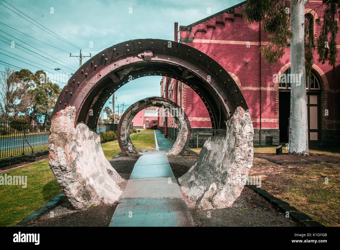 Old rusty metal and concrete huge sewage pipe sections on display Stock ...