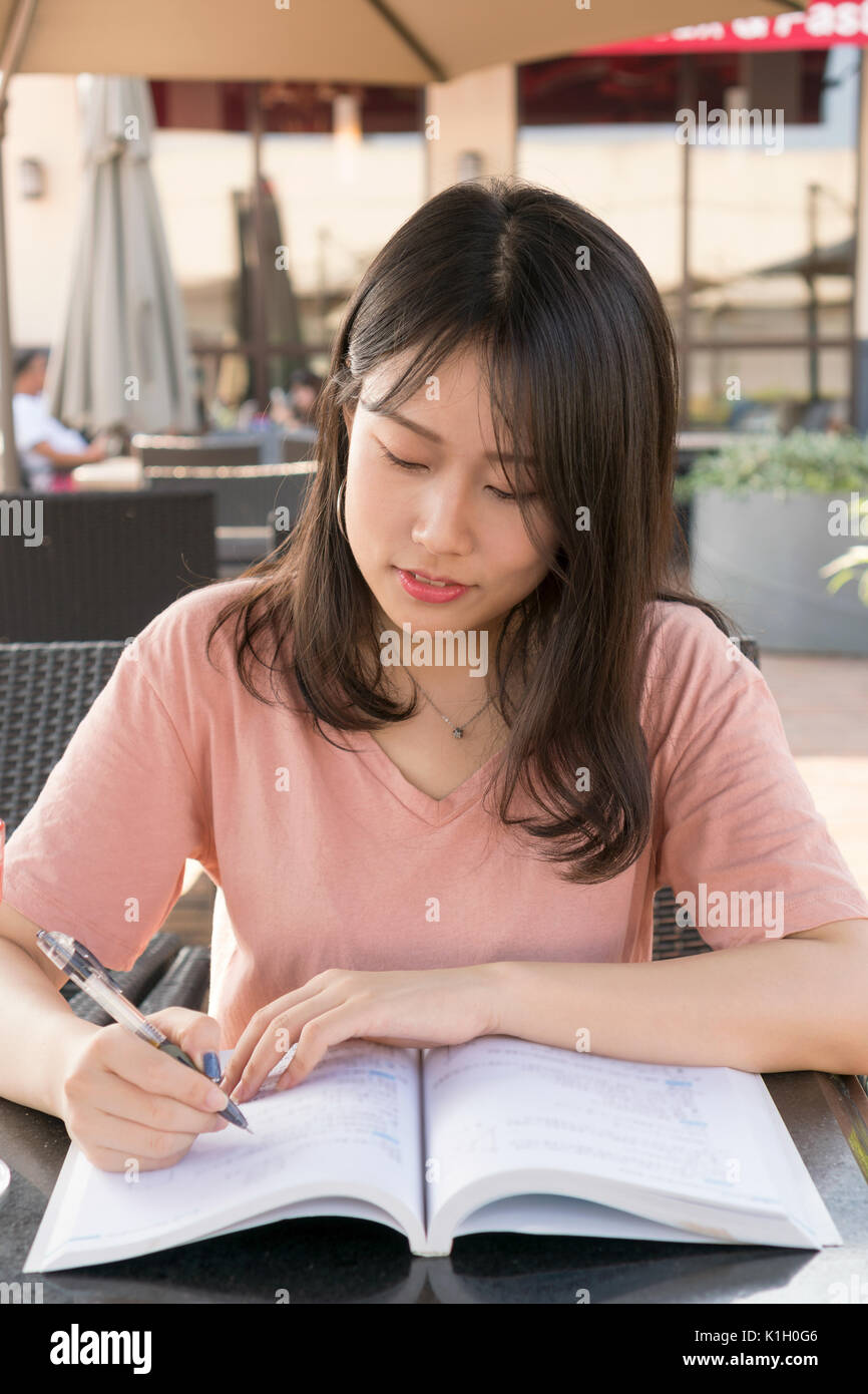 asian girl is studying Stock Photo - Alamy