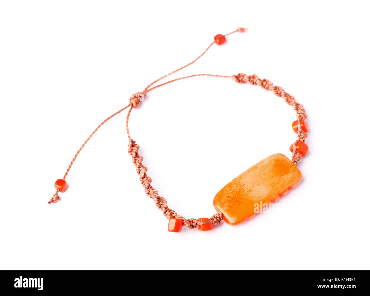 Beautiful orange friendship bracelet isolated on white background Stock ...