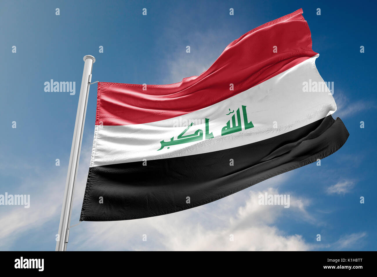 Iraq flag is waving at a beautiful and peaceful sky in day time while ...
