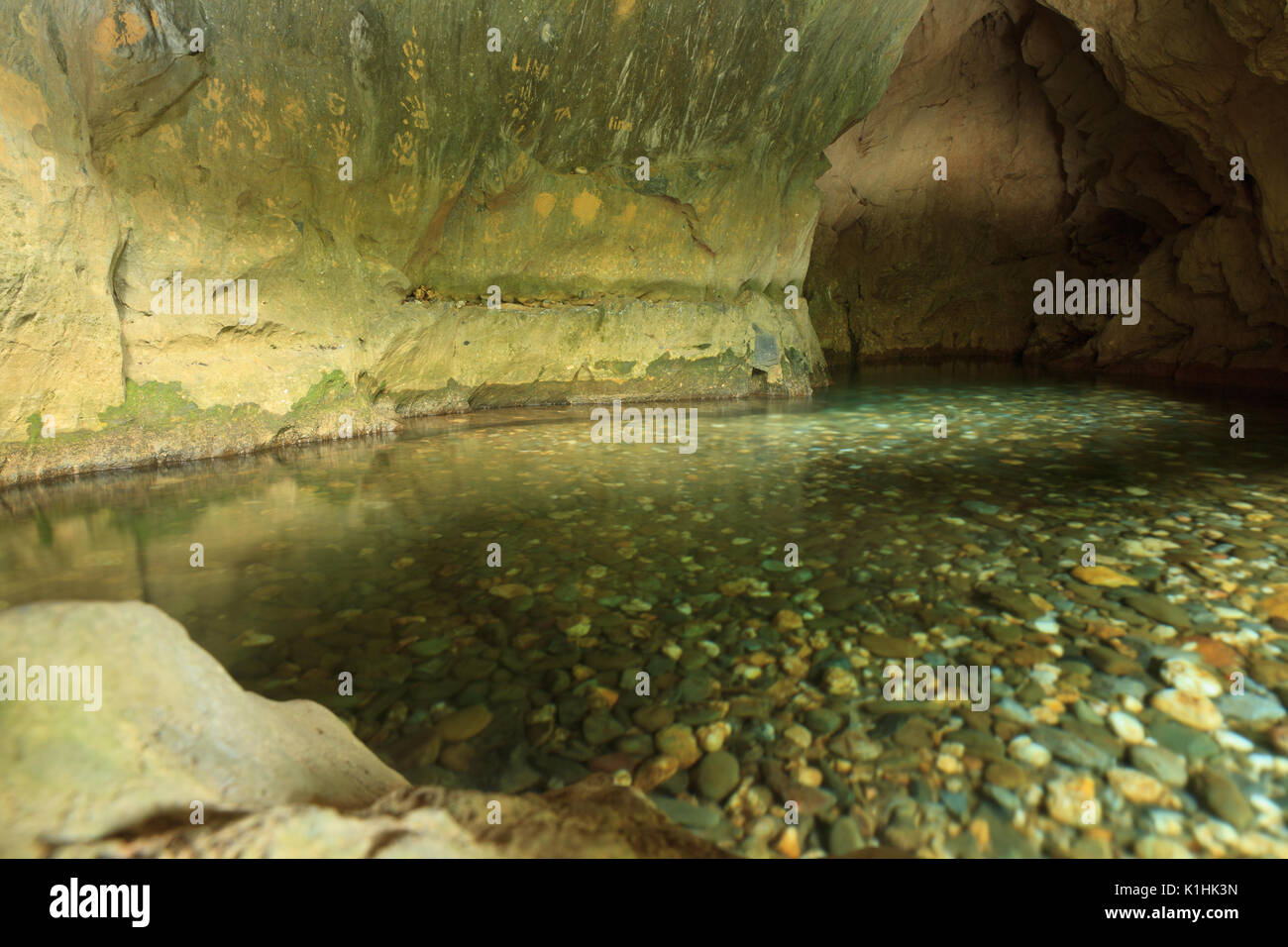 River coming out of cave Stock Photo - Alamy