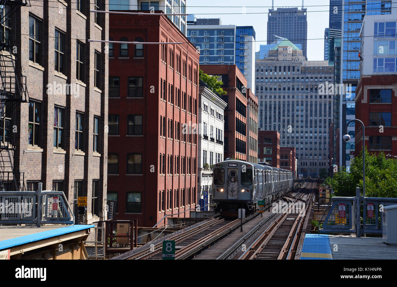 A north bound Brown Line CTA train arrives at the Chicago Avenue ...