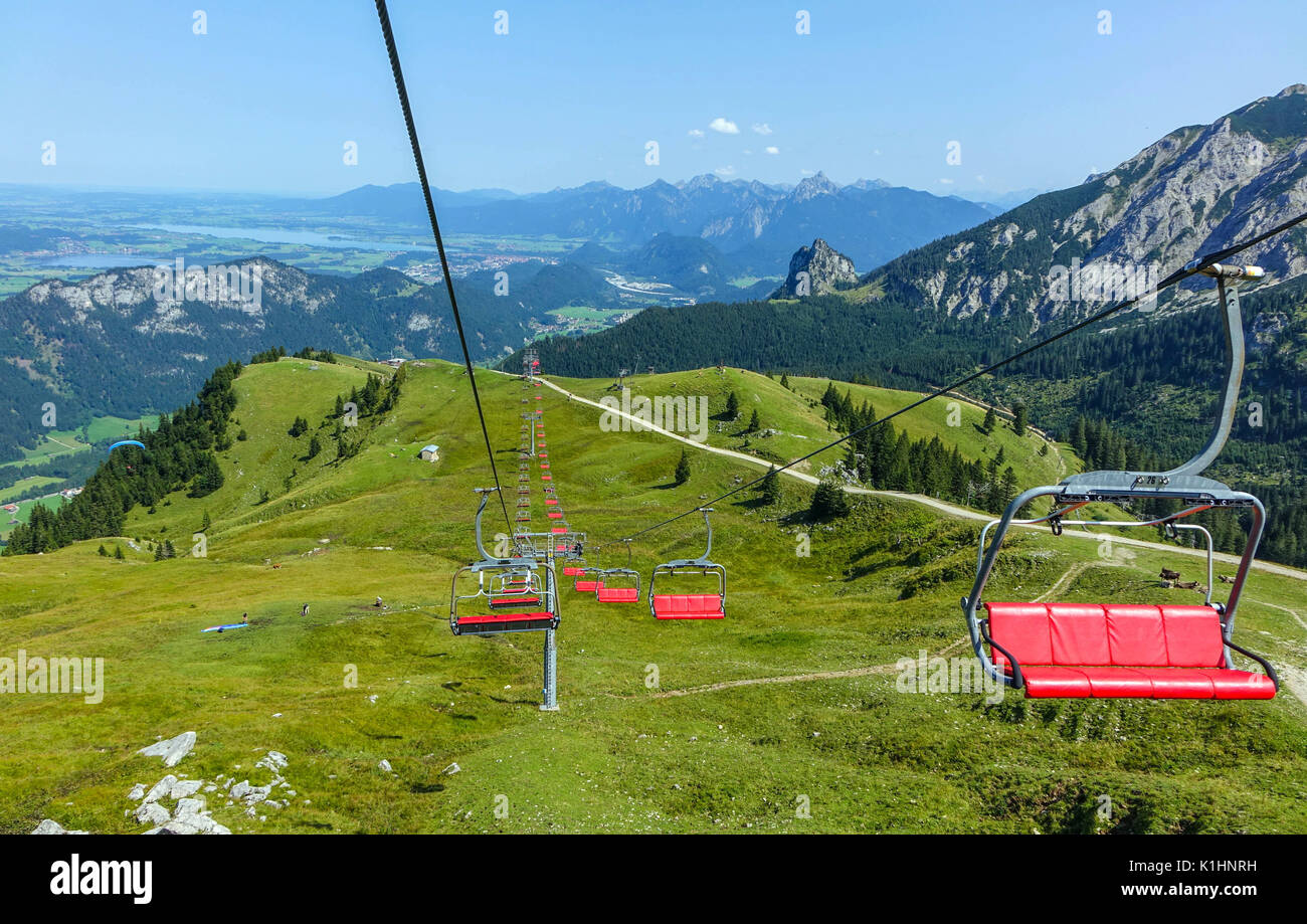 Red chairlift on Breitenberg-Hochalpe Pfronten, Bavaria, Germany Stock ...